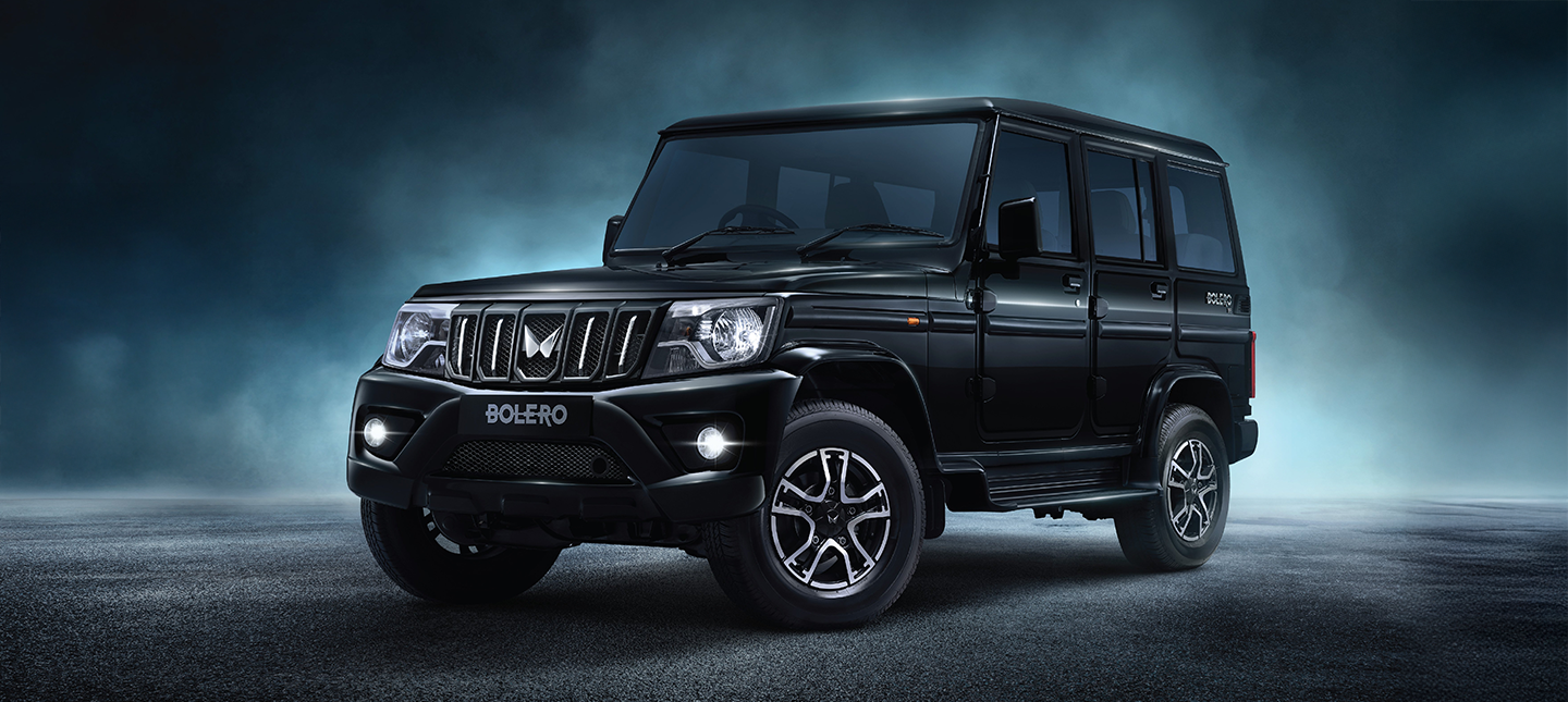 Mahindra Bolero vs Mahindra XUV 3XO EV Comparison of Price, Mileage ...
